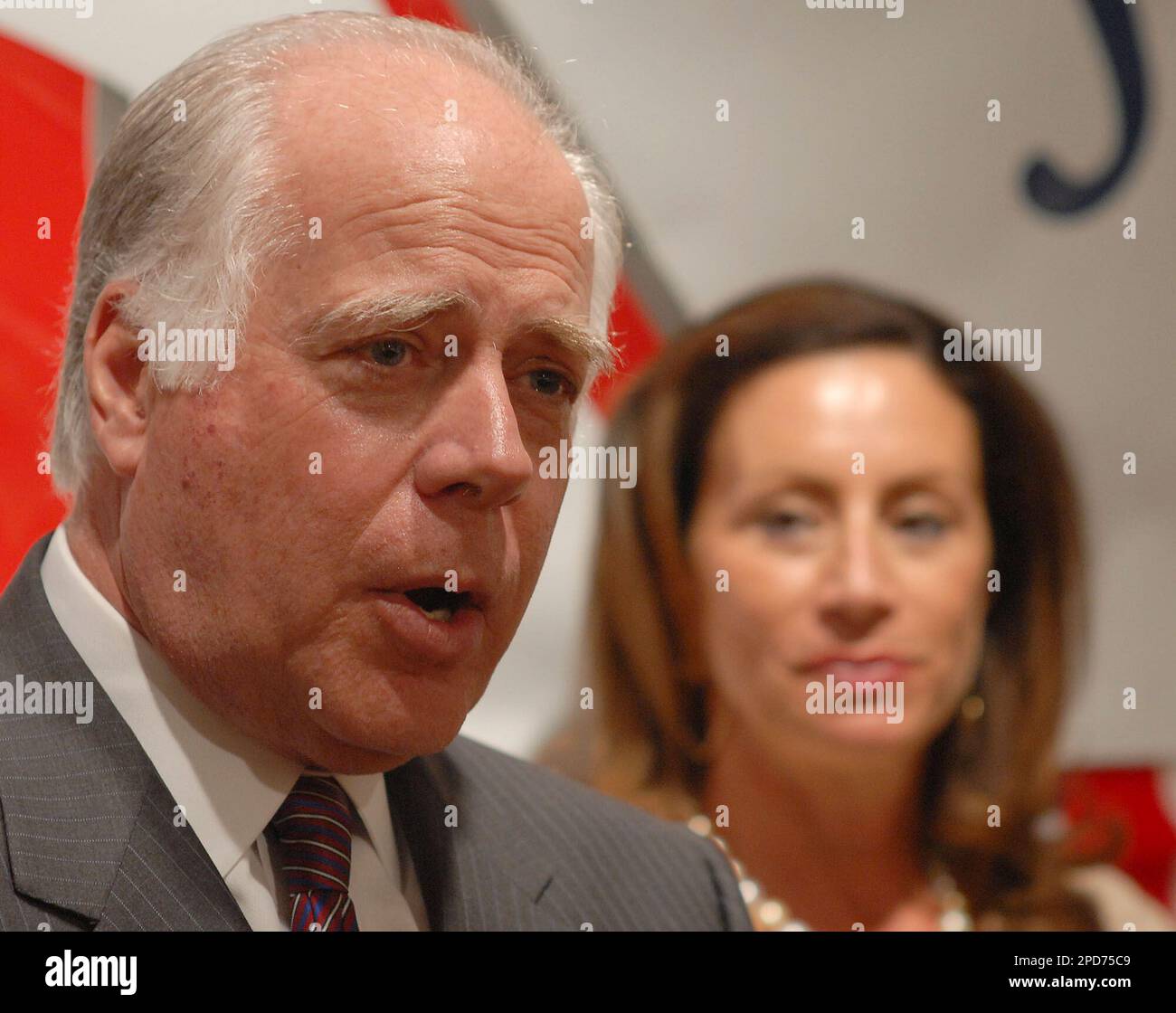 Republican candidate for the U.S. Senate, John Raese, left, accompanied ...