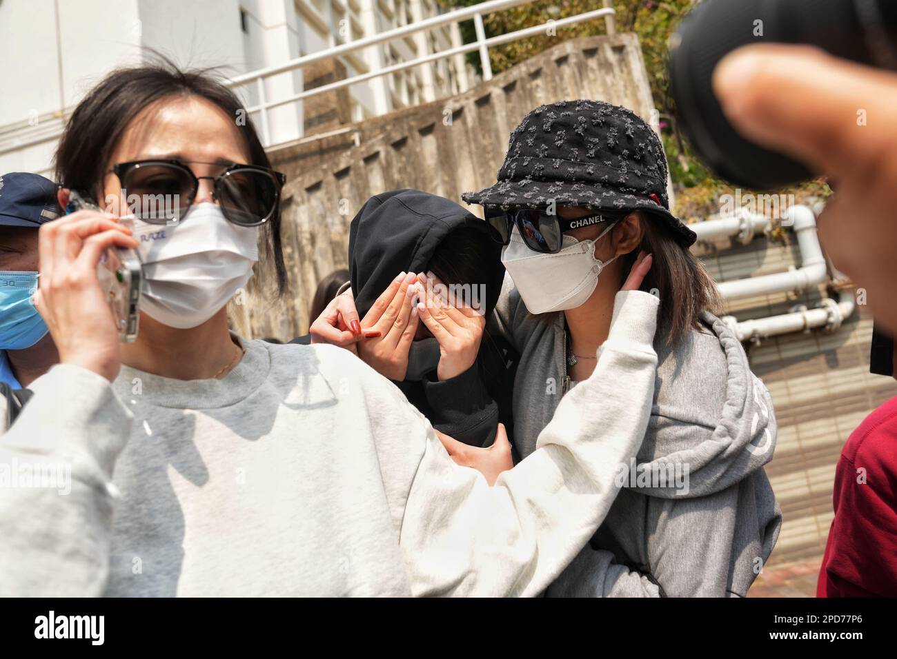 Irene Pun Hau-yin ( In black hoodie), the seventh suspect who is ...