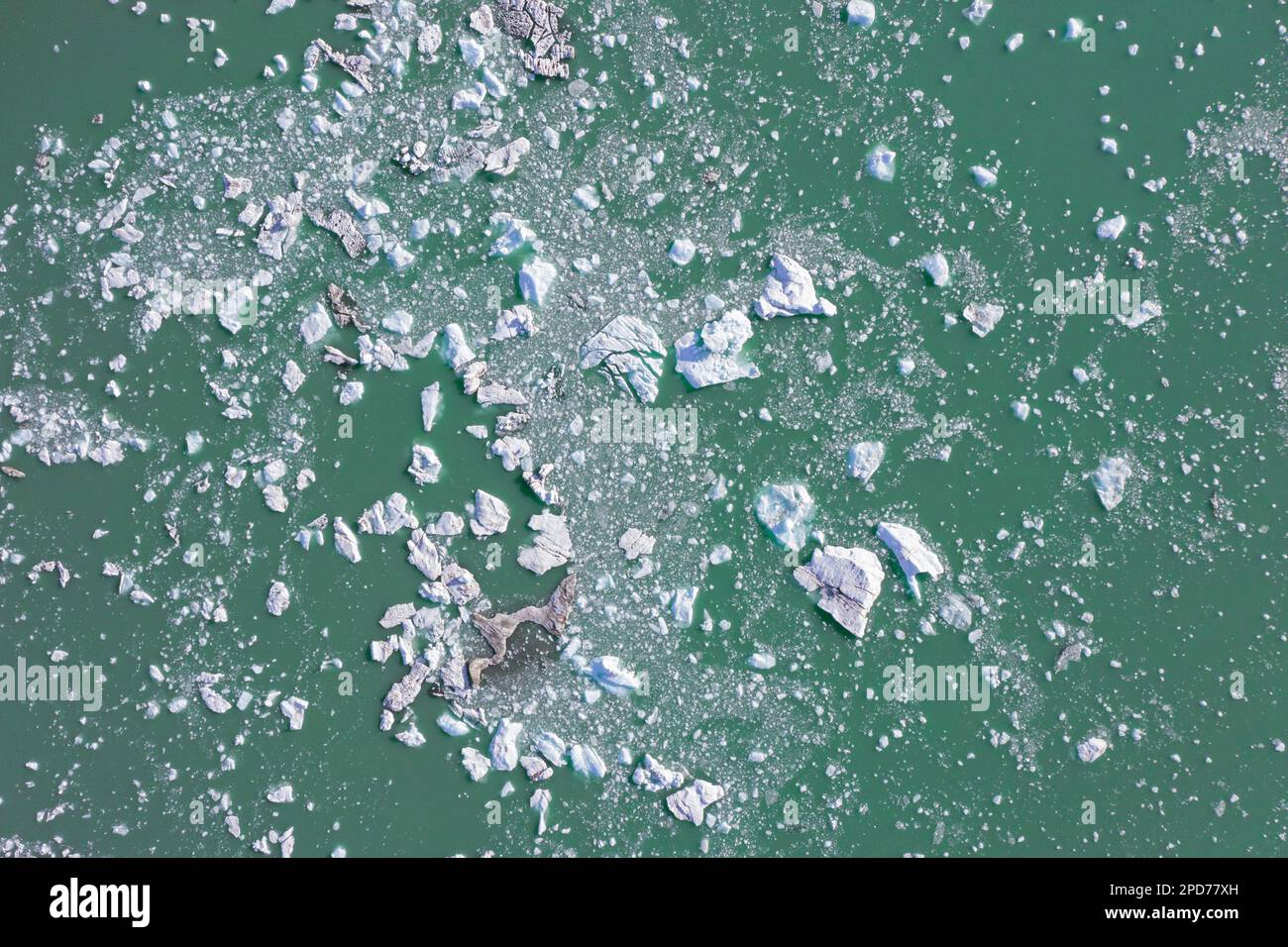 Aerial view of floating drift ice / icebergs in Recherche Fjord, coming ...