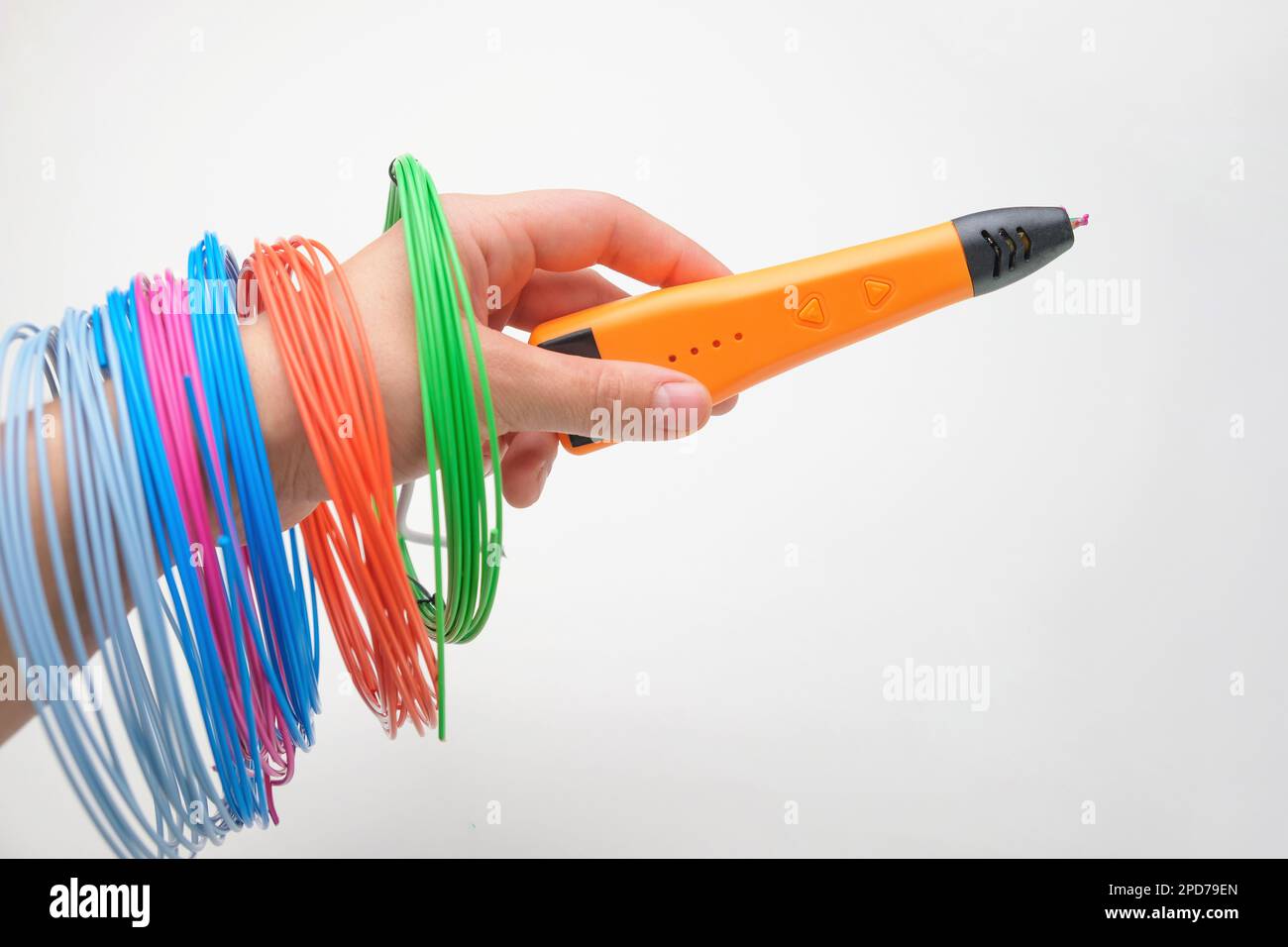 3d Pen. Printing with Colored Plastic Wire Filament. Child making a ...