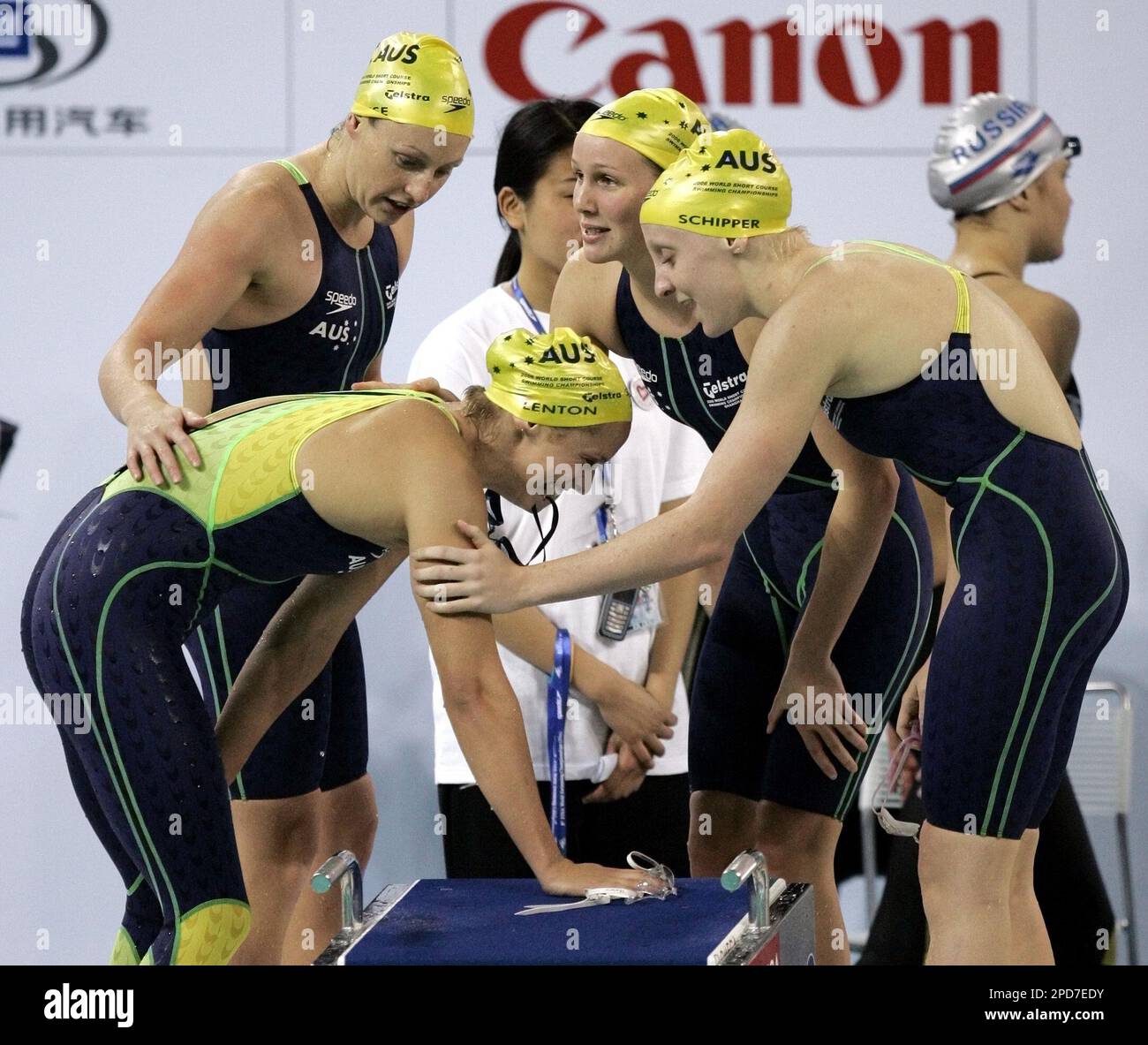 The Australian team celebrate their win in the final of the Women's 4x200 meters Freestyle at ...