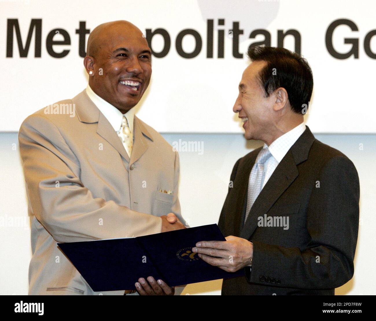 Half-Korean Super Bowl MVP Hines Ward, left, receives an honor ...