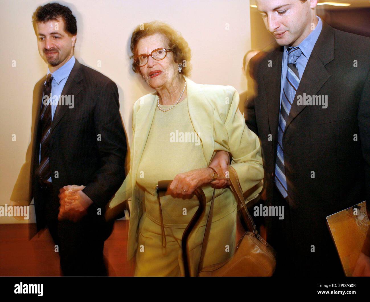 Maria Altmann, center, is escorted into the Los Angeles County Museum ...