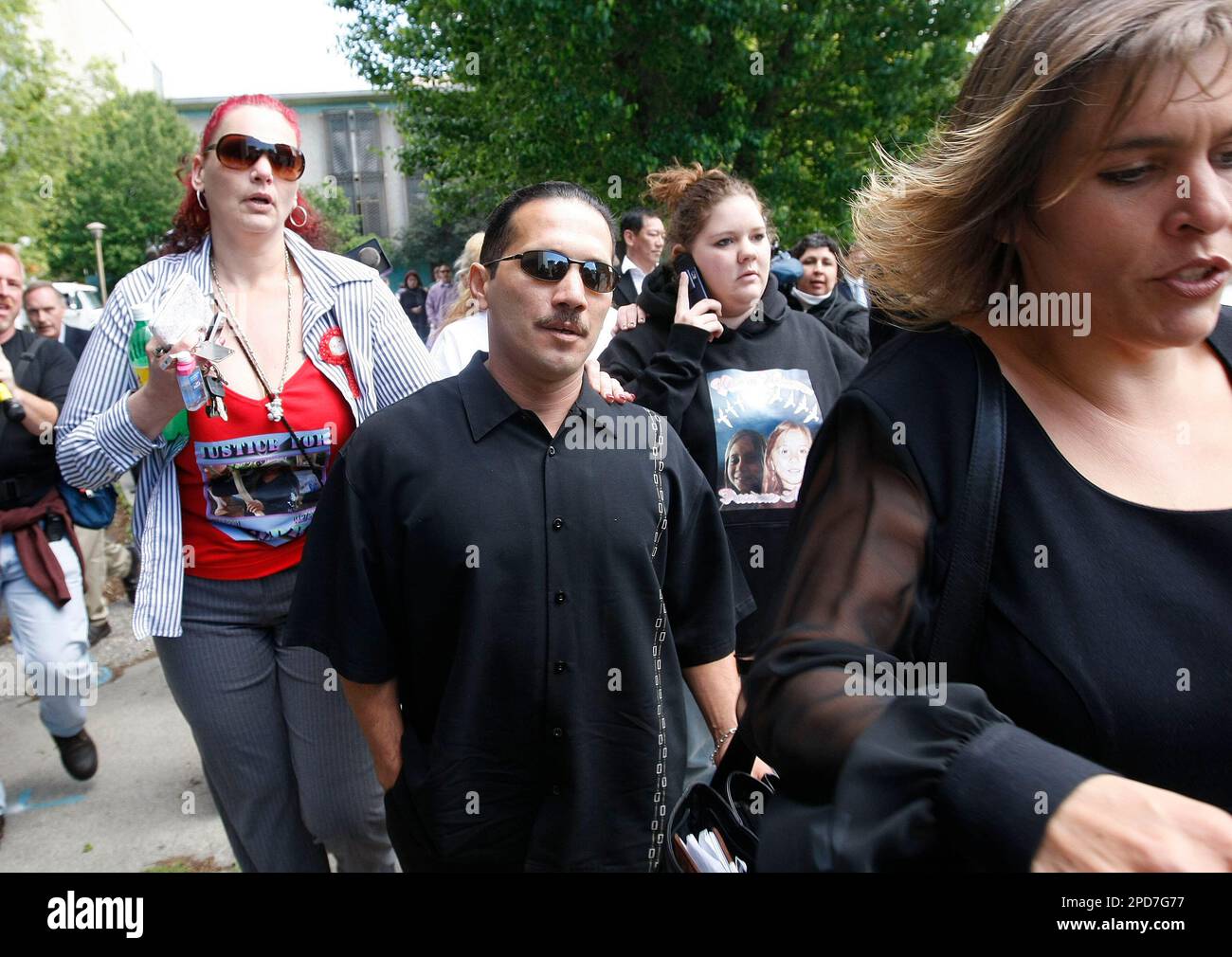 Daniel Cantu, (center), the father of 8-year-old, Sandra Cantu, leaves ...