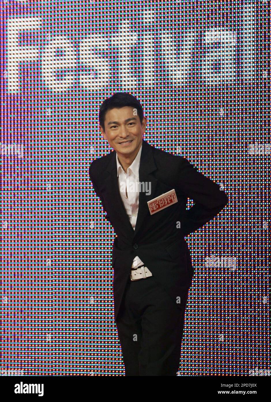 Hong Kong actor Andy Lau poses during the opening ceremony of the 30th ...