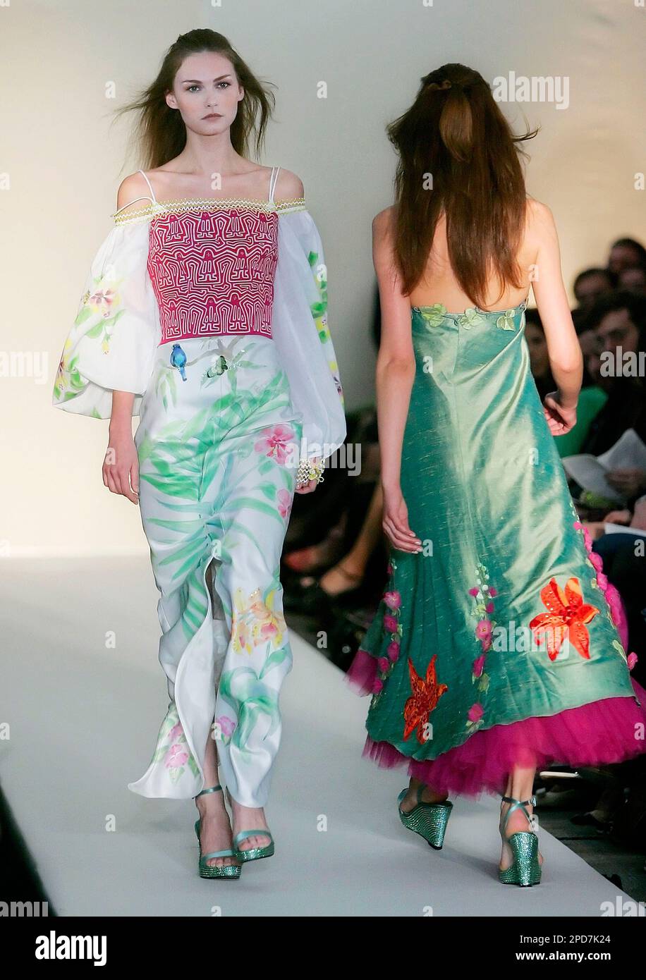 Models walk the runway during the Fashion For Development Show, Monday ...