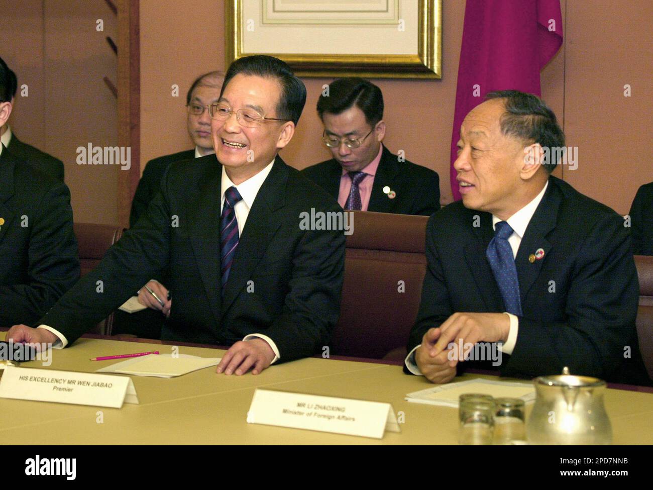 Chinese Premier Wen Jiabao, left, sits with Chinese Foreign Minister Li ...