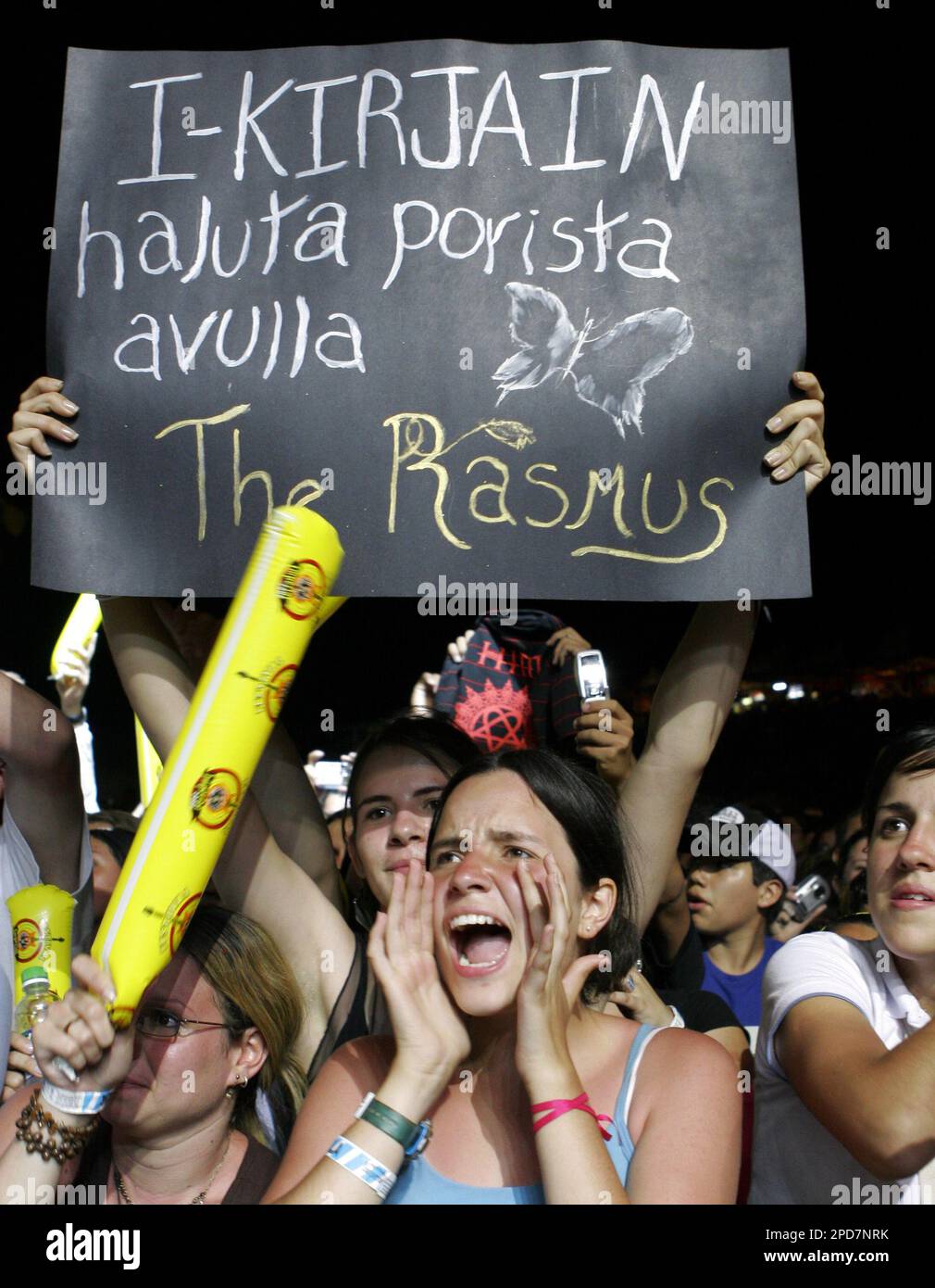 Costa Rican fans of The Rasmaus, of Finland, cheer at the Imperial 2006 ...