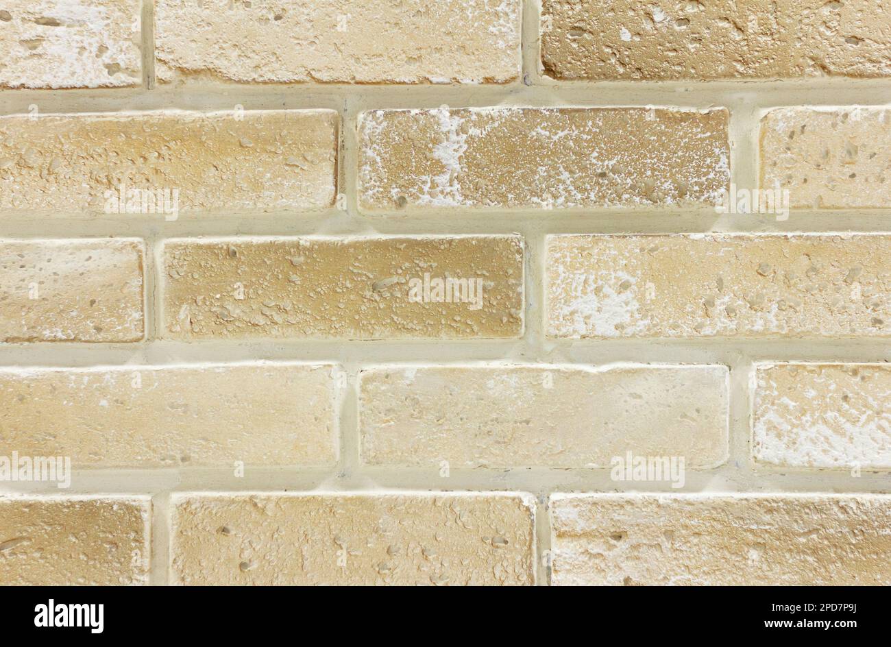 Professionally installed light brown Ornamental brick wall forms part ...