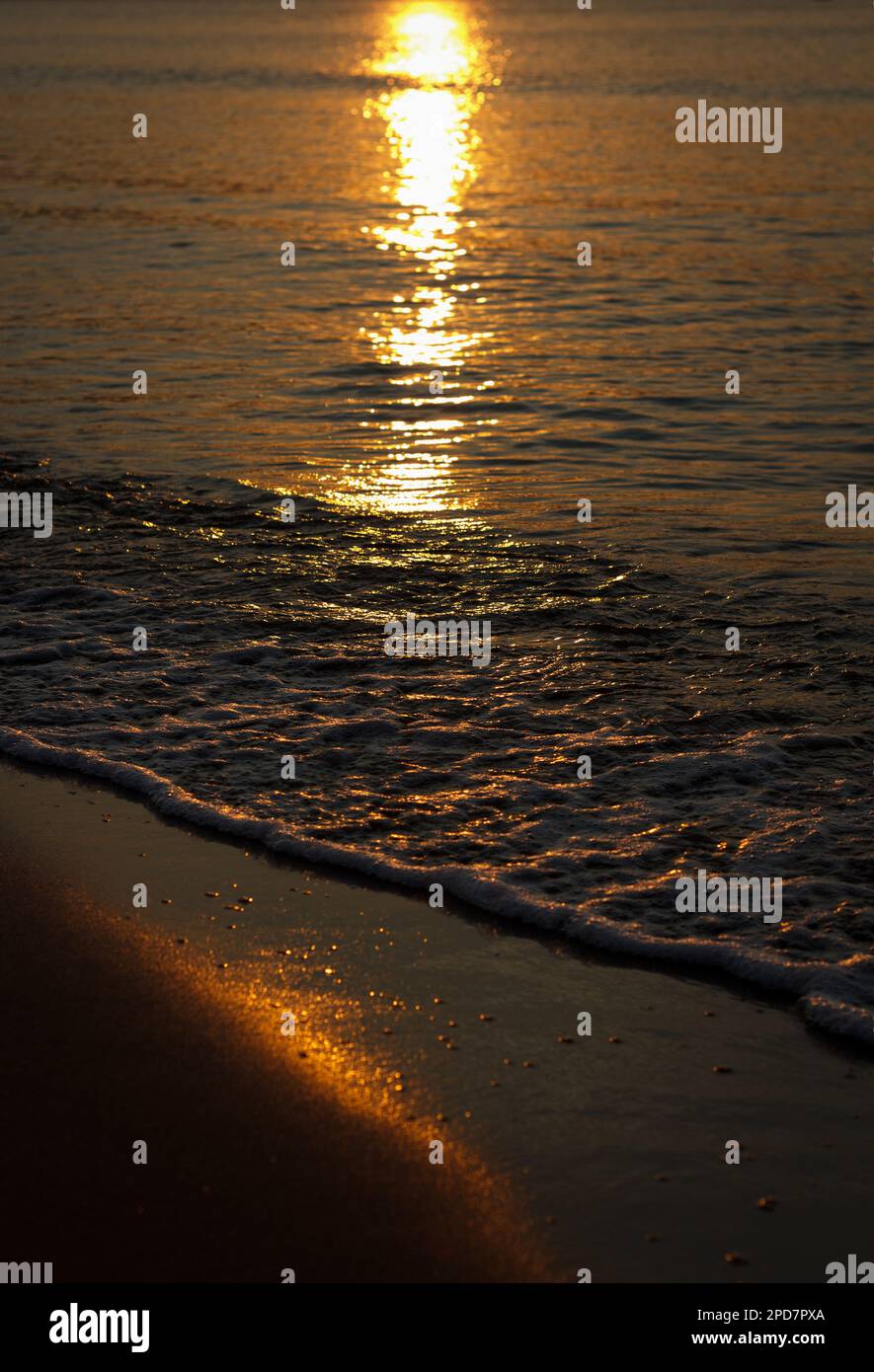 Magic early summer dawn at sea, first rays of sun are reflected in ...