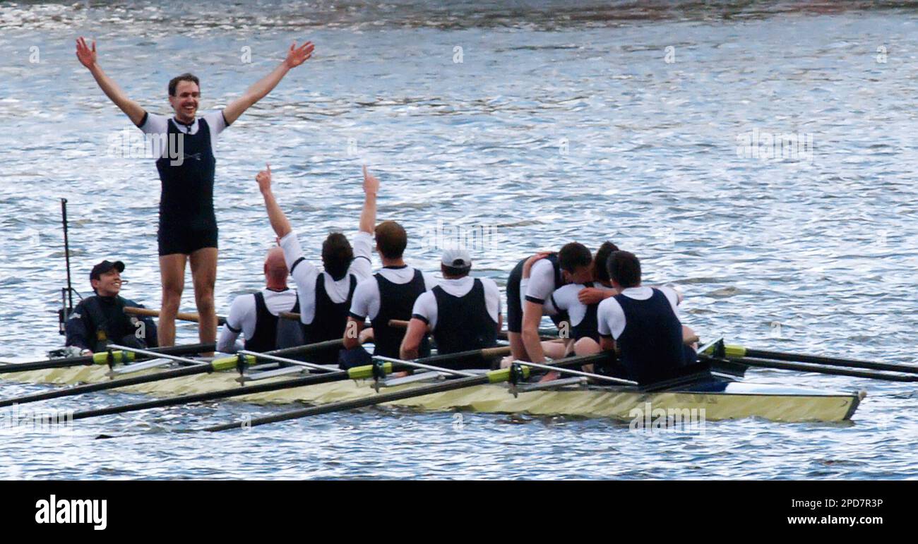 Oxford's French stroke, Bastien Ripoll, 2nd left, stands in the boat as ...