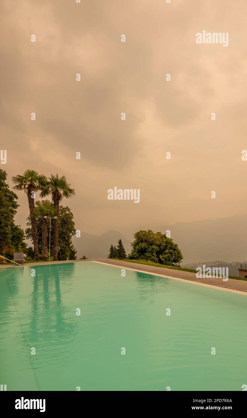 Swimming Pool with Panoramic View with Mountain in Ticino, Switzerland ...
