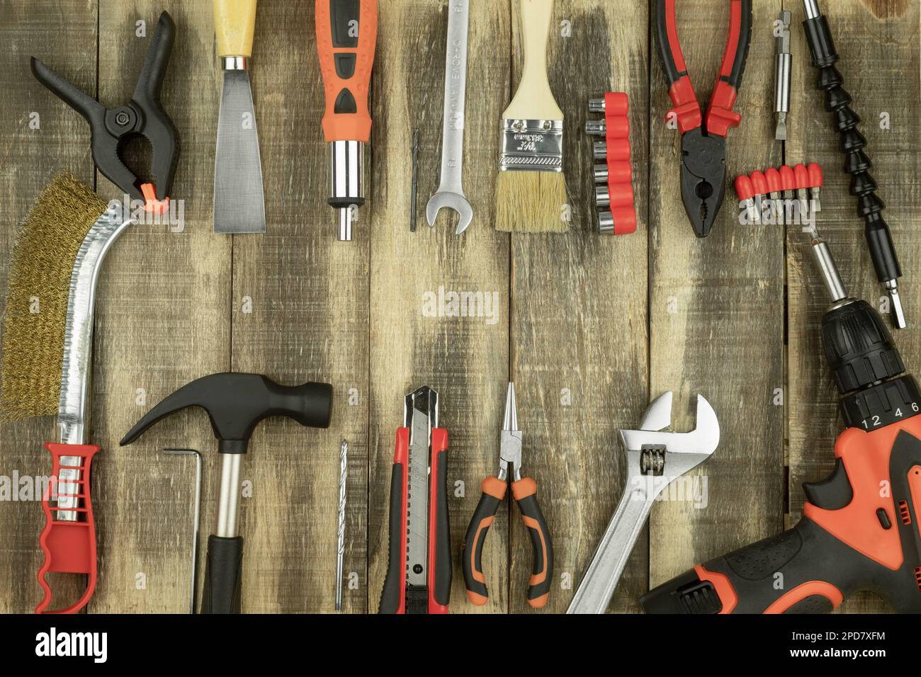 Tools on a rustic background with copy space. Working tools on a wooden ...