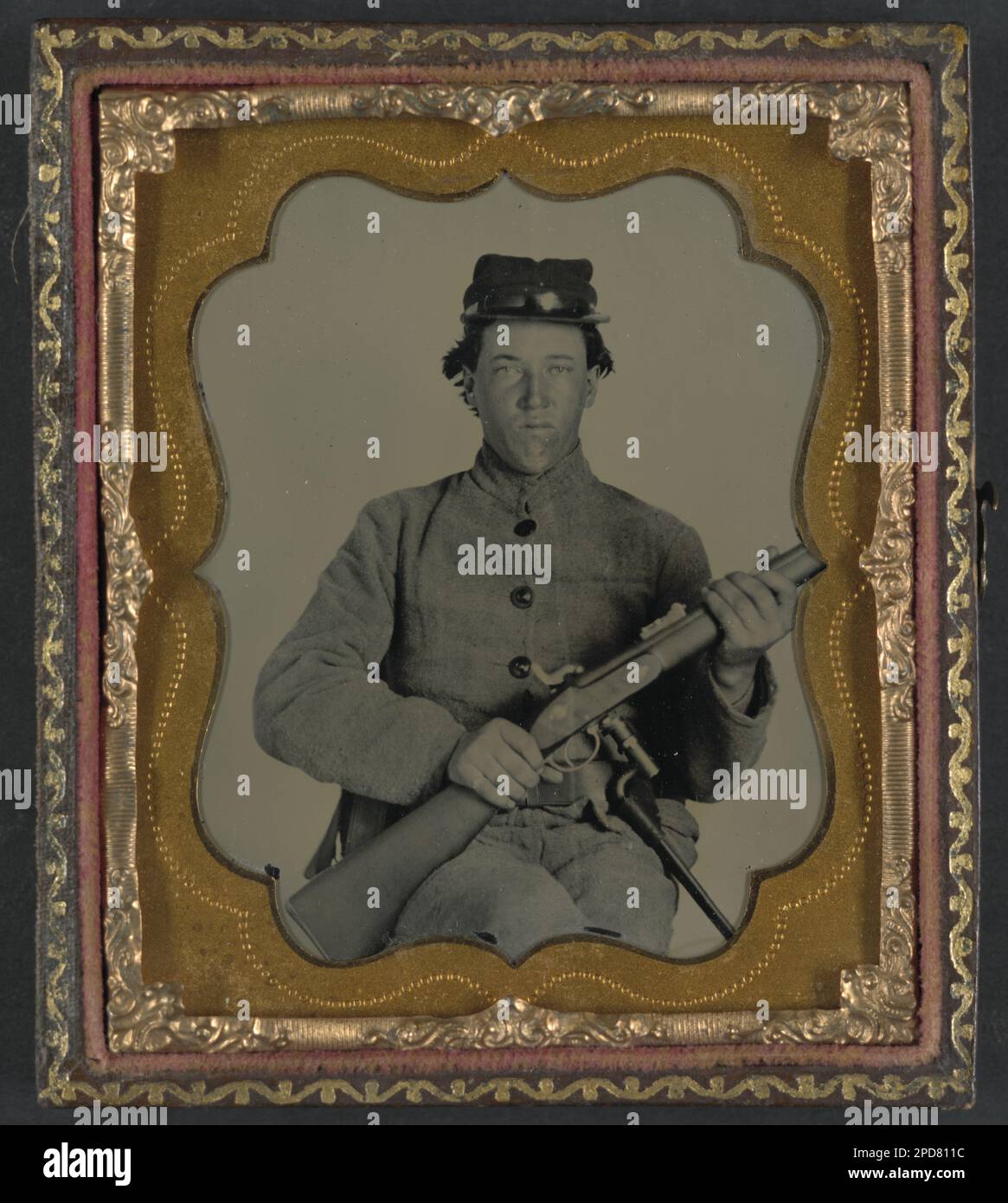 Unidentified soldier in Confederate uniform with Enfield rifle ...
