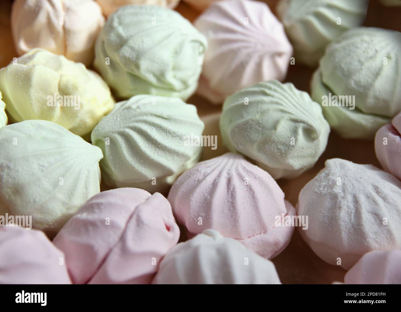 Marshmallow production. Fresh sweet multi-coloured marshmallows, just ...