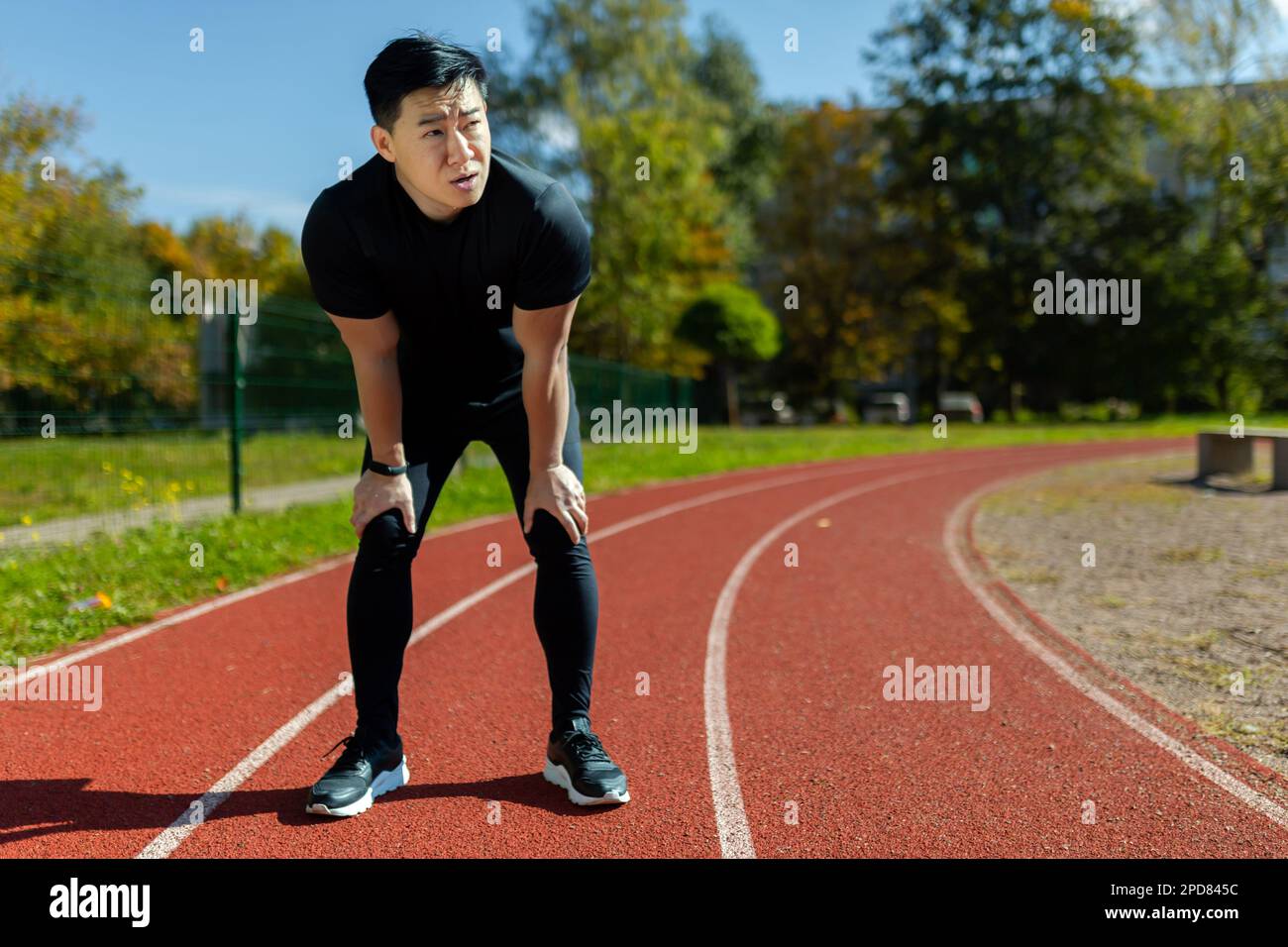 Out of breath asian hi-res stock photography and images - Alamy