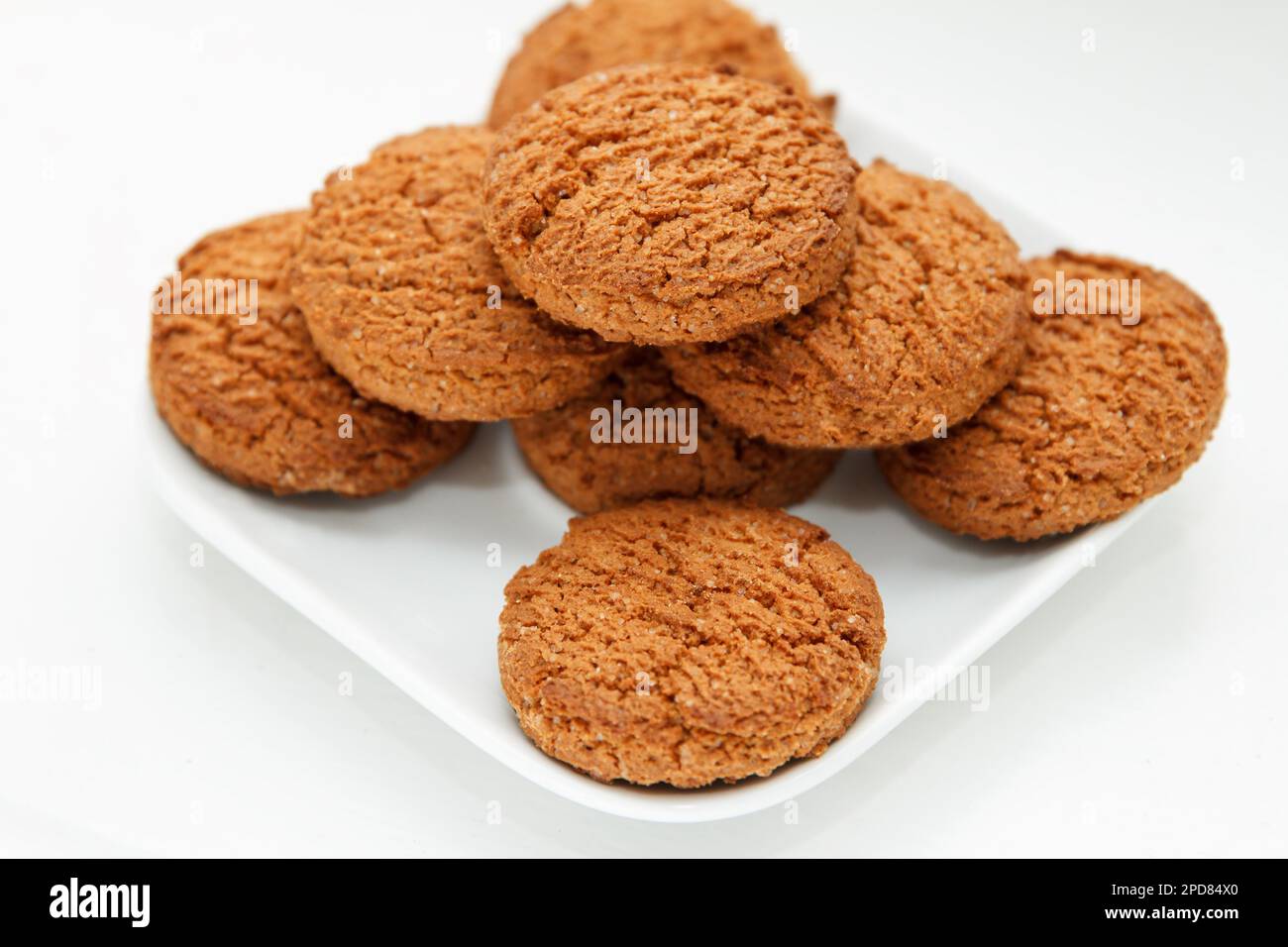 Sweet crisp, freshly baked oatmeal, folded in a triangle shape on a ...