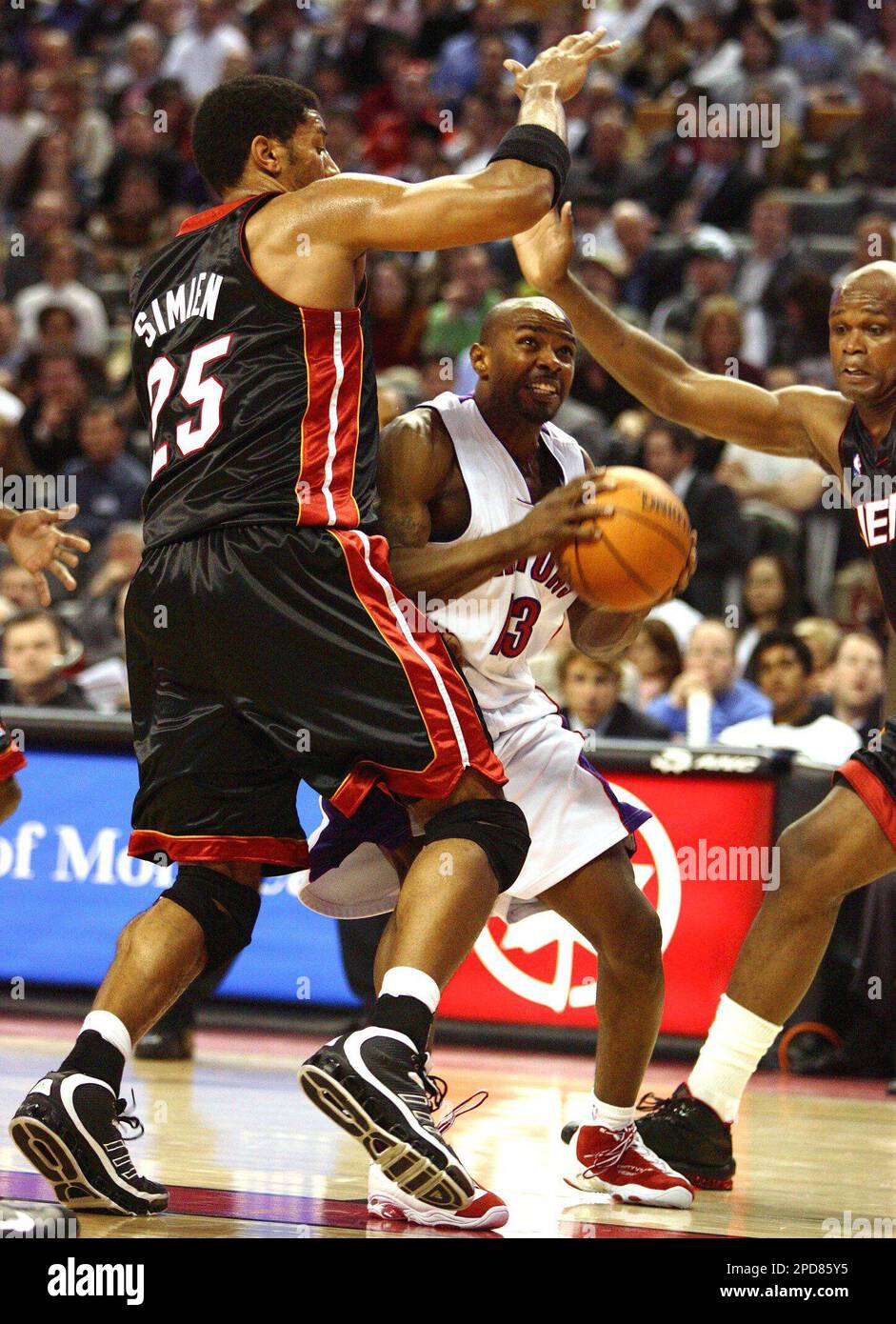 Toronto Raptors guard Mike James (13) is shut down by Miami Heat ...