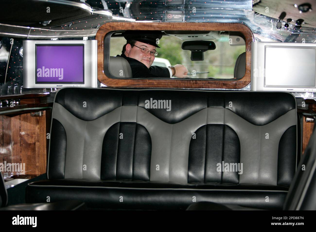 Tyler Lehmann, owner of Blackstone Limousine, is shown in one of two of ...