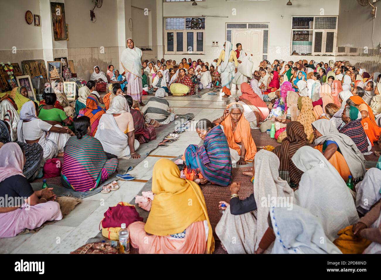 Widows praying in an Balaji ashram, Vrindavan, Mathura district, India ...