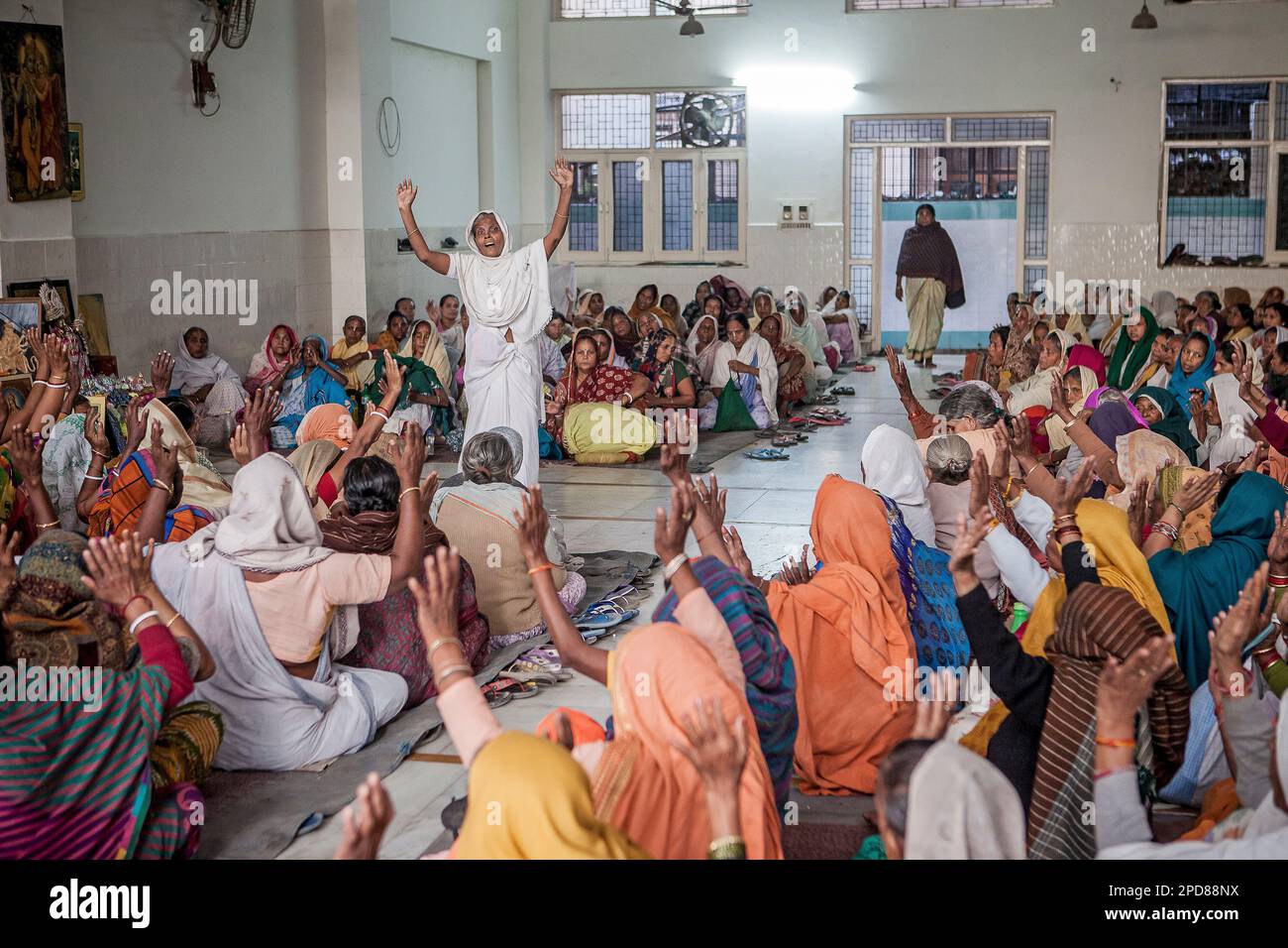 Widows praying in an Balaji ashram, Vrindavan, Mathura district, India ...
