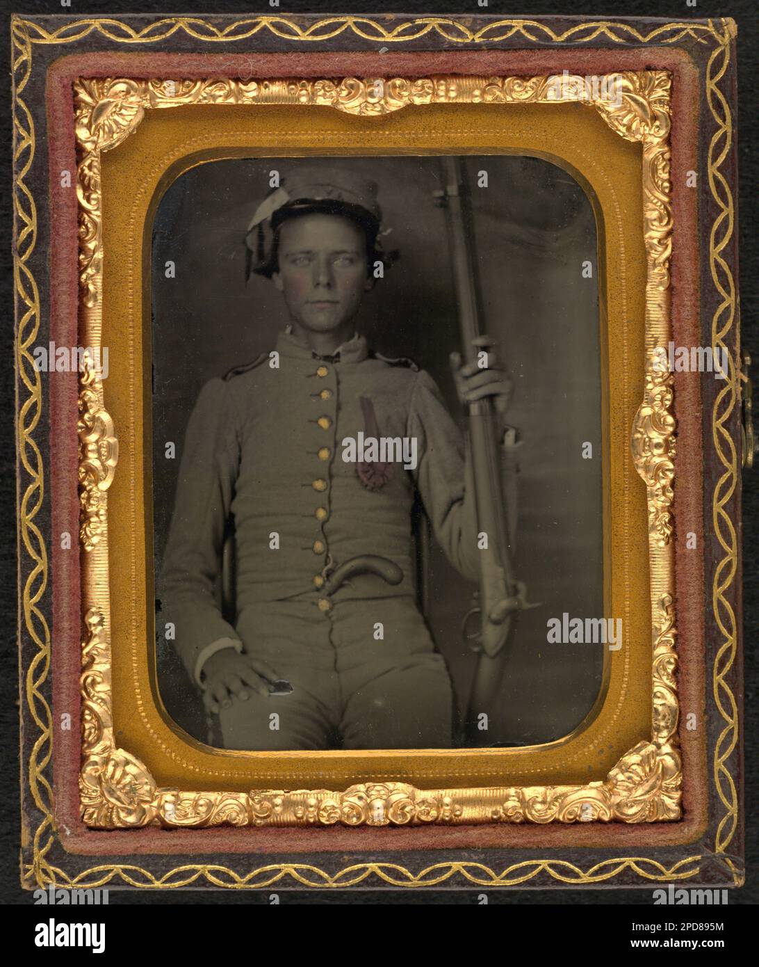 Unidentified soldier in Confederate uniform with secession badge with ...