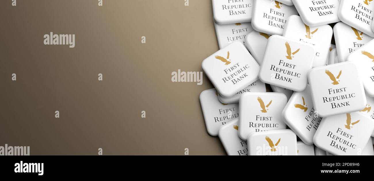 Logos of First Republic Bank on a heap on a table. Copy space. Web ...