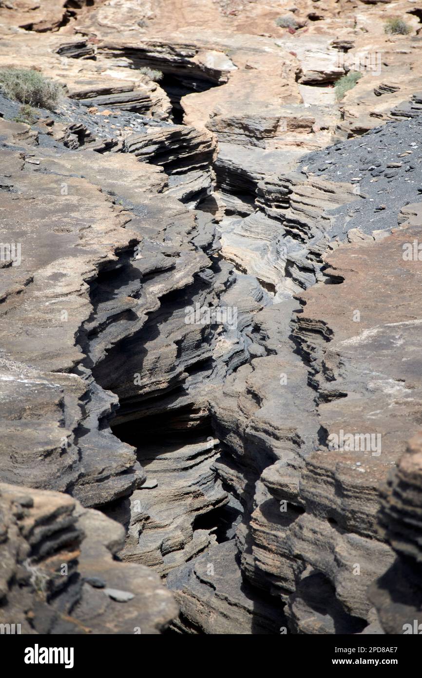 volcanic rock layers in crevices worn out by erosion las grietas ladera ...