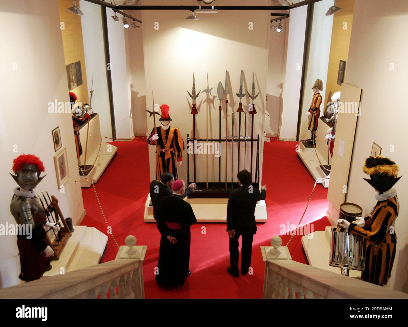 Swiss guards uniforms and weapons are on display at "The Pontifical ...