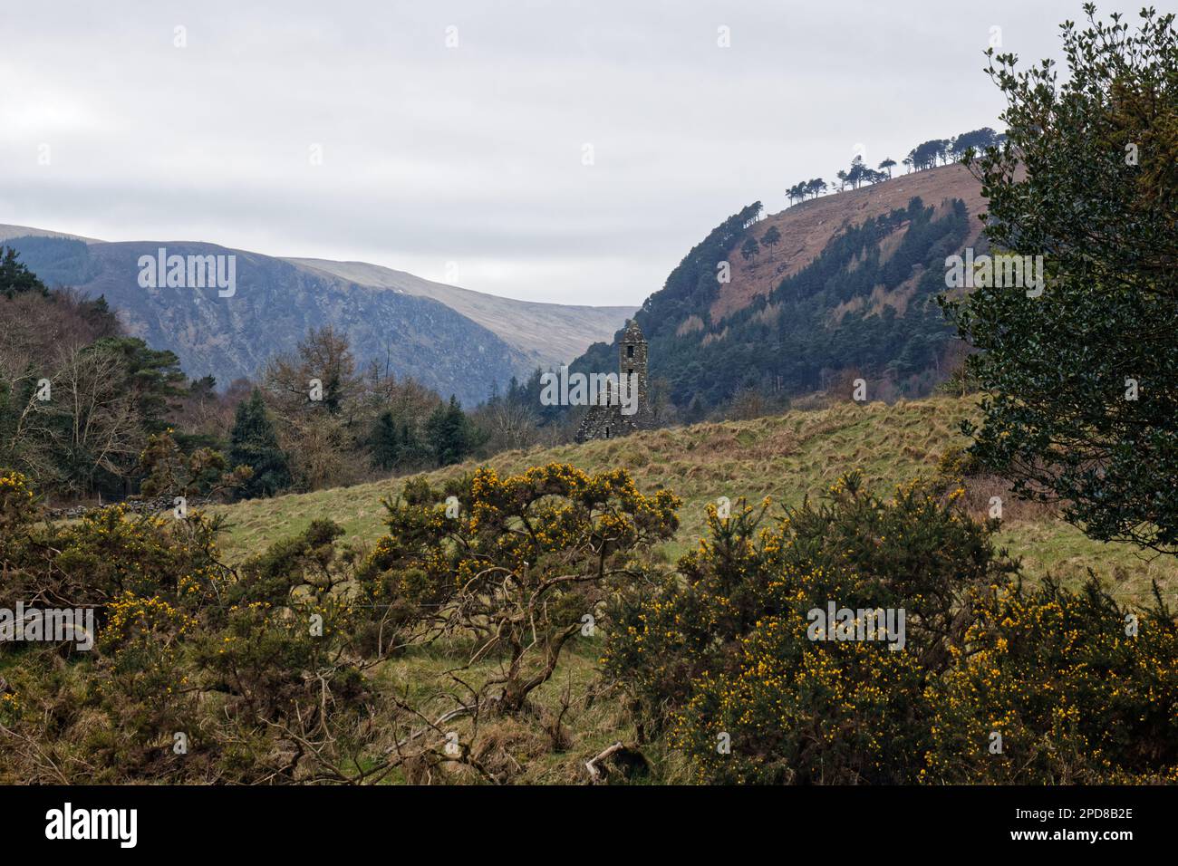 The Chapel of Saint Kevin seen from behind a hill, in Glendalough ...