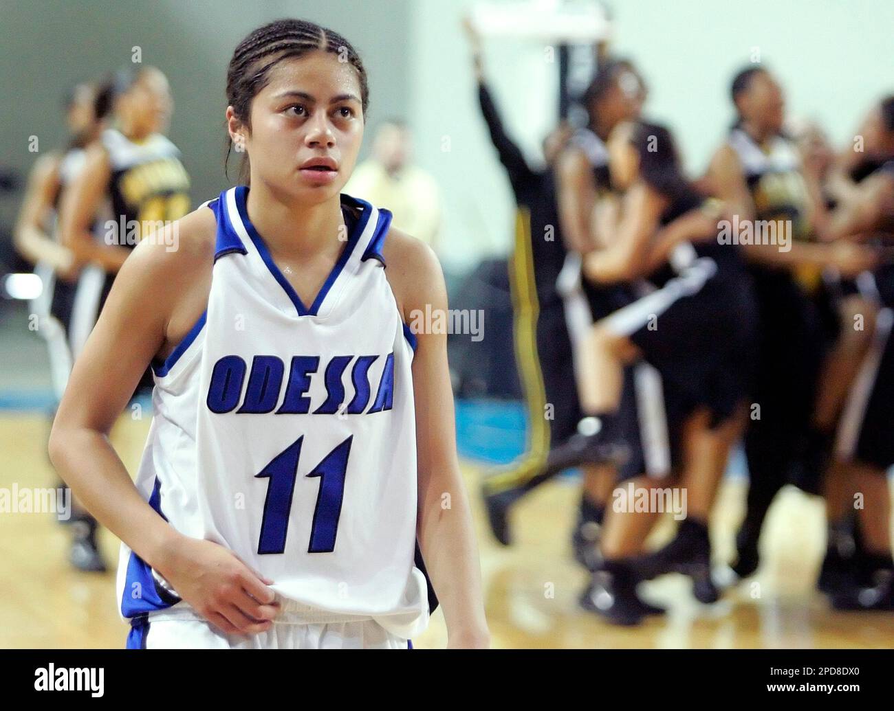 Odessa guard Helen Roden, of Australia, walks back to her team's bench ...