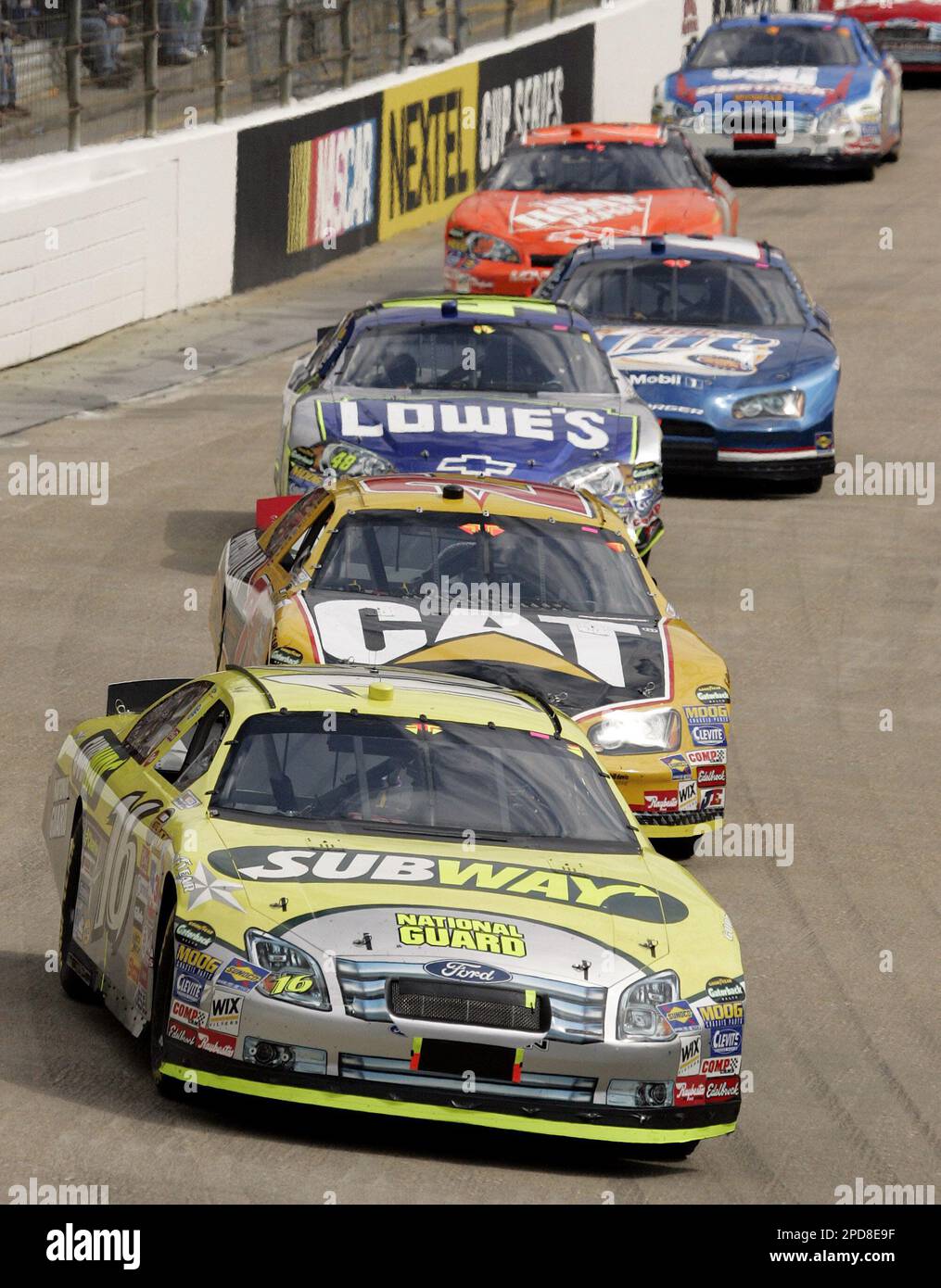 Greg Biffle leads the pack through a turn in the Food City 500 on ...