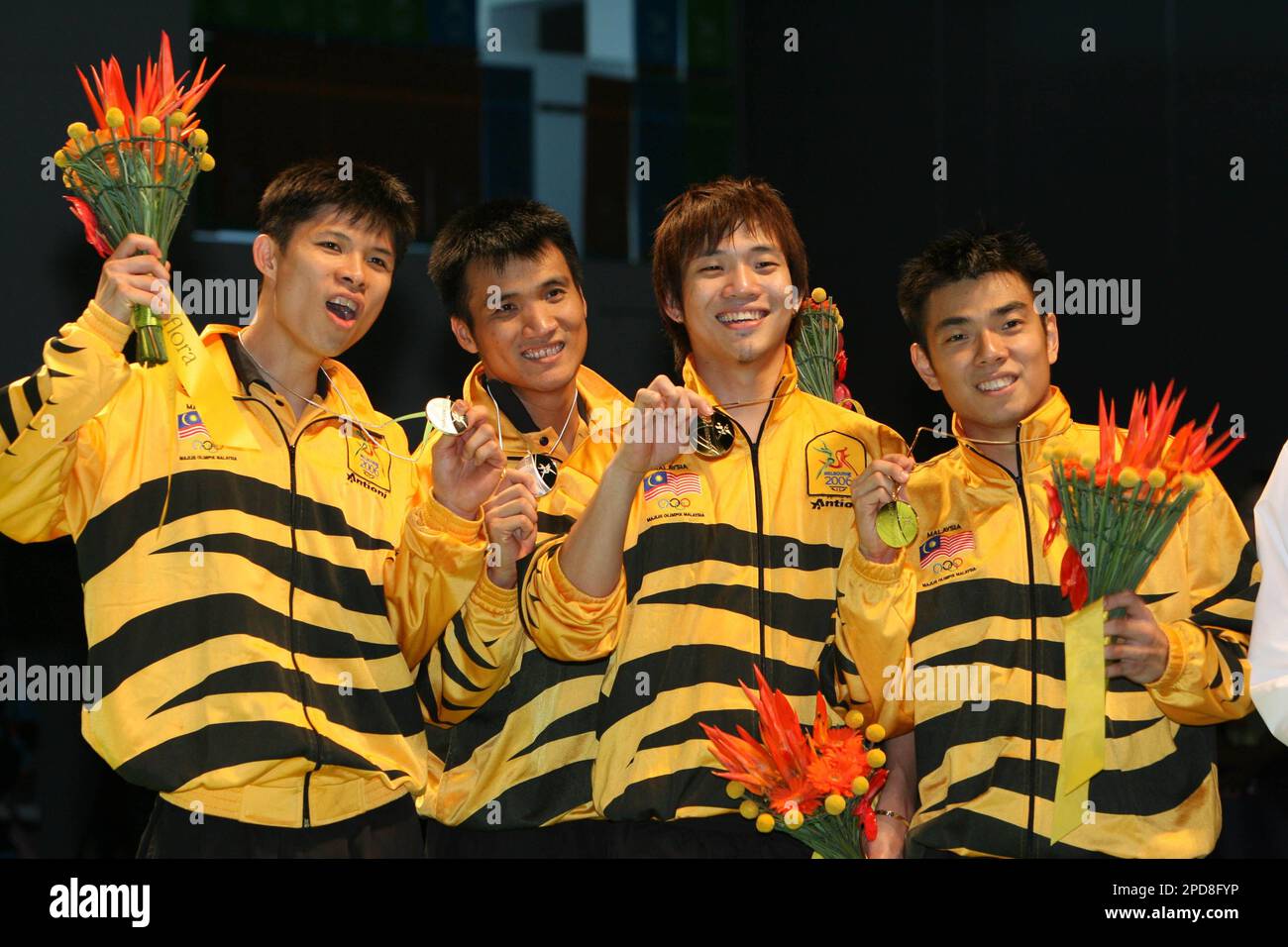 Gold medalists Malaysia's Chong Ming, right, and Koo Kien Keat, 2nd ...
