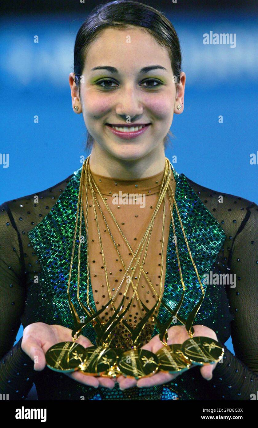 Canadian Alexandra Michel Orlando poses with her five gold medals she ...