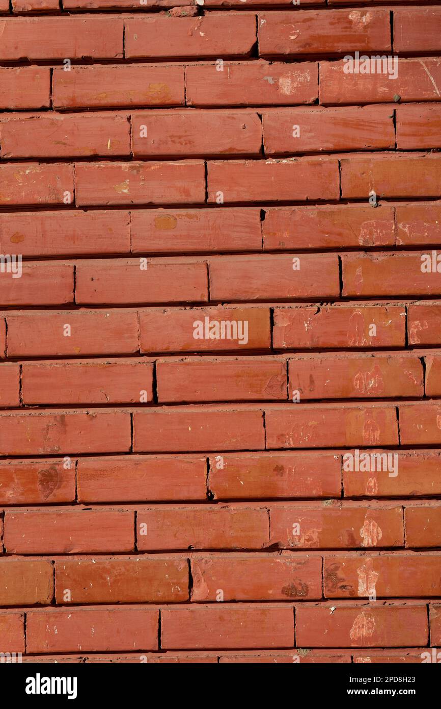 A Vertical brick wall alley background texture Stock Photo - Alamy