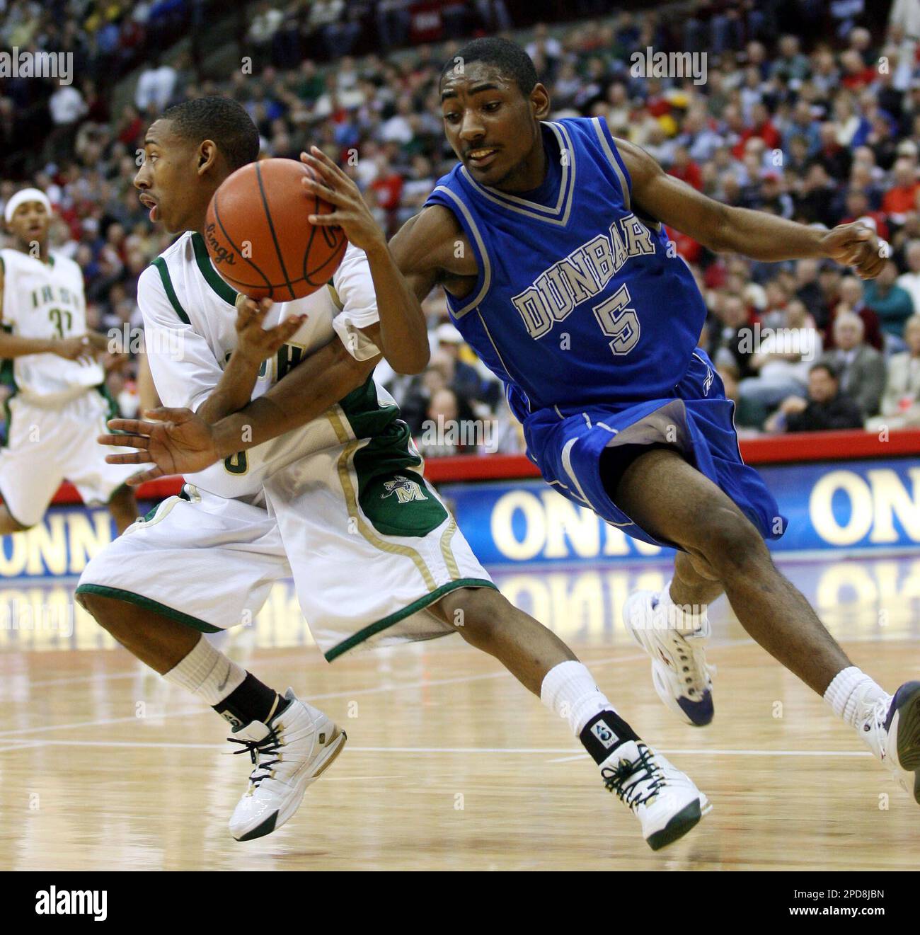 Akrton St. Vincent-St. Mary's Cameron Joyce, left, is pressured by ...