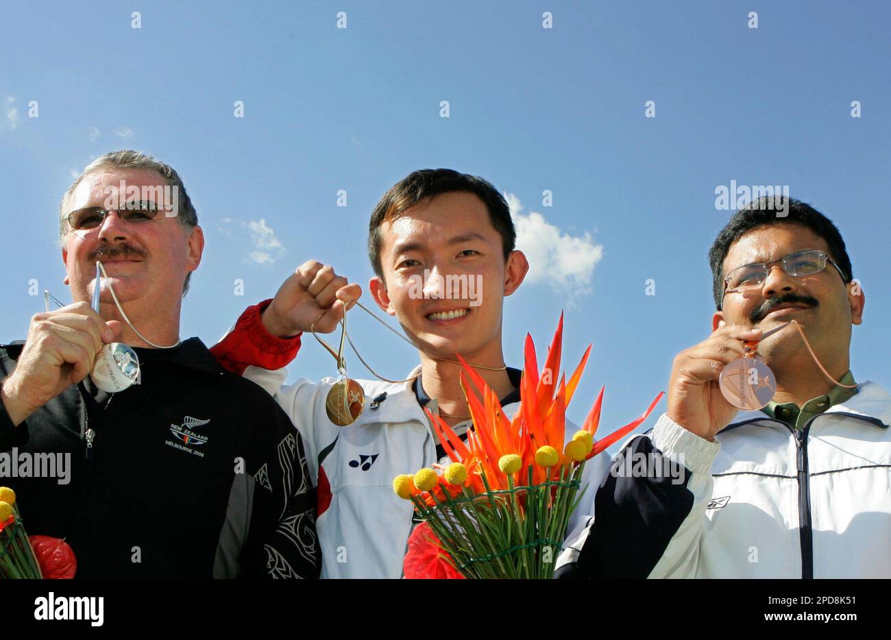 Gold medal winner Singapore's Shaw Ming On, center, silver winner New ...