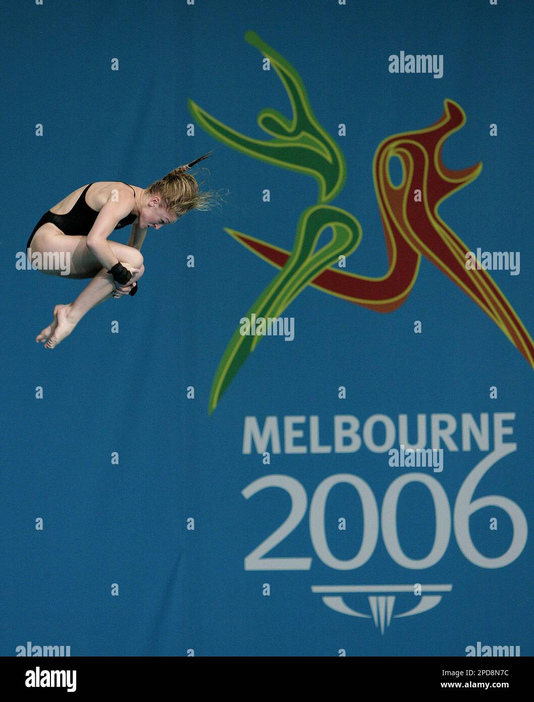 Sarah Barrow of England performs her dive during the Commonwealth Games ...