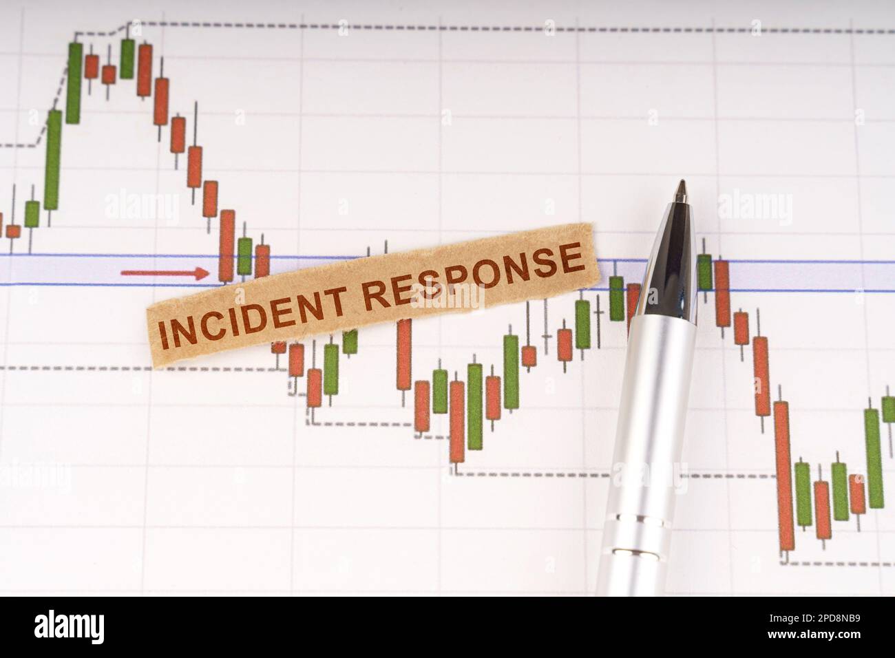 Business concept. On the chart of business quotes lies a pen and torn ...