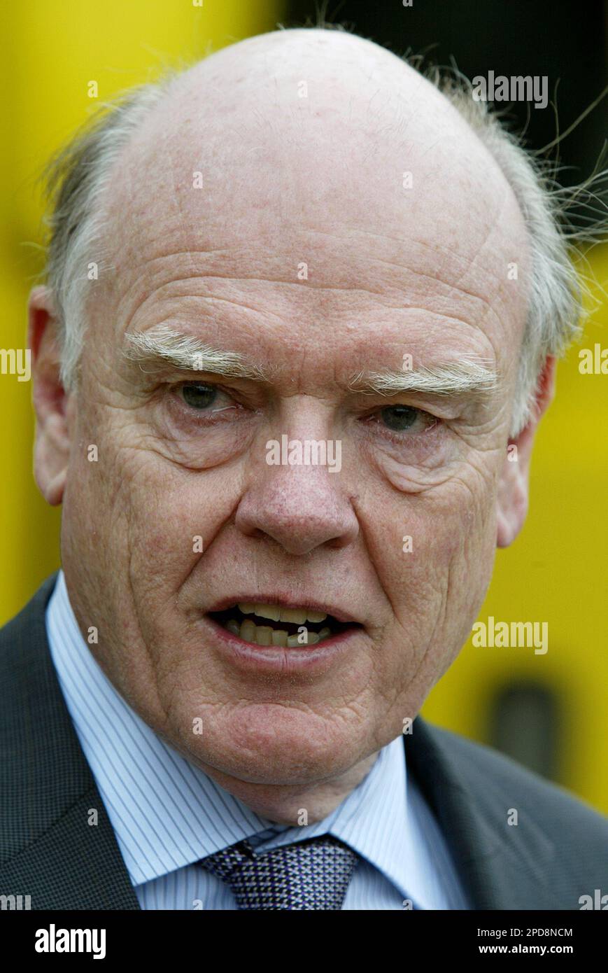 U. S. Treasury Secretary John Snow answers questions at a news ...