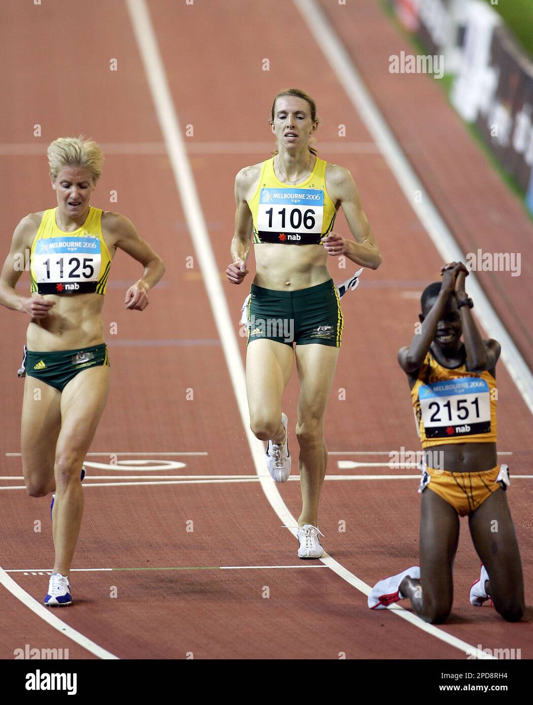 Dorcus Inzikuru of Uganda celebrates after crossing the finish line to ...