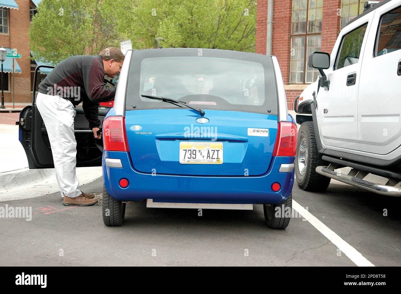 Graham Hill, vice president of the Toronto-based Feel Good Cars, gives ...