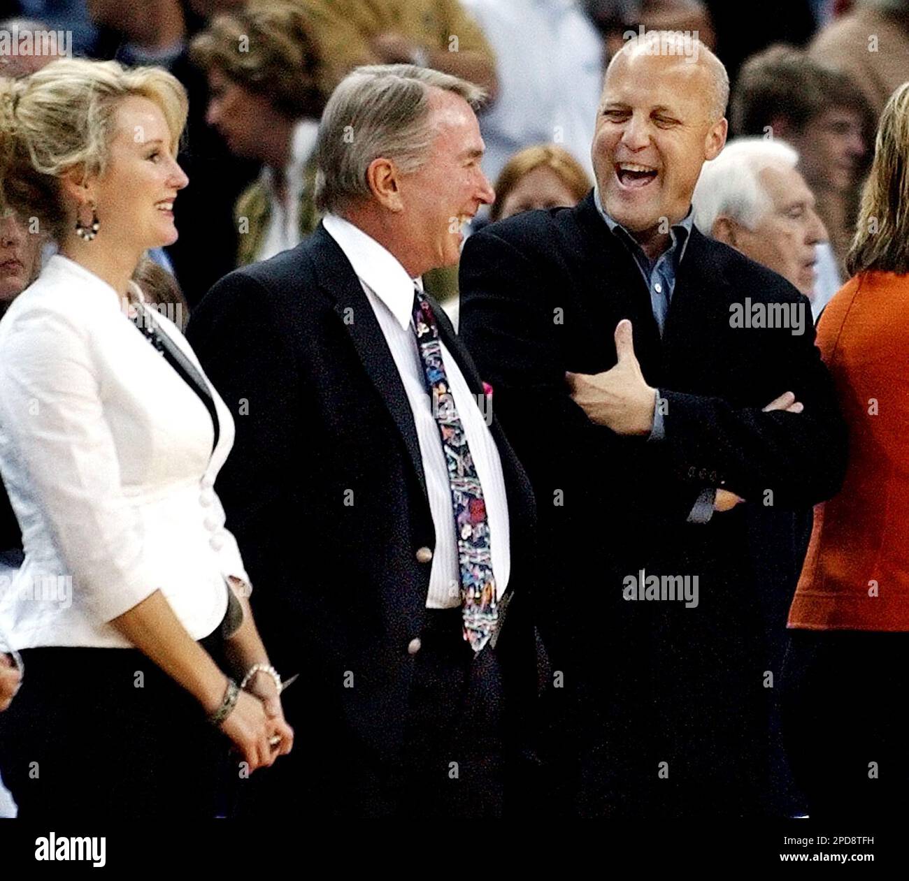 New Orleans Hornets owner George Shinn, center, and his wife Denise ...