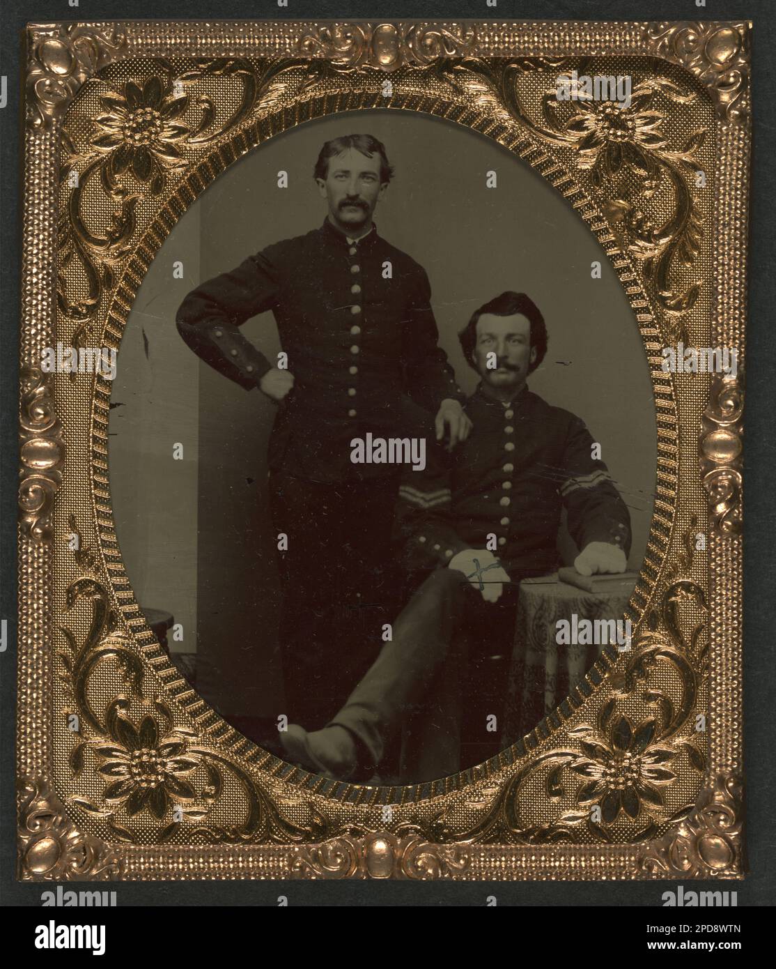 Two unidentified soldiers in Union uniforms, one in corporal's uniform ...