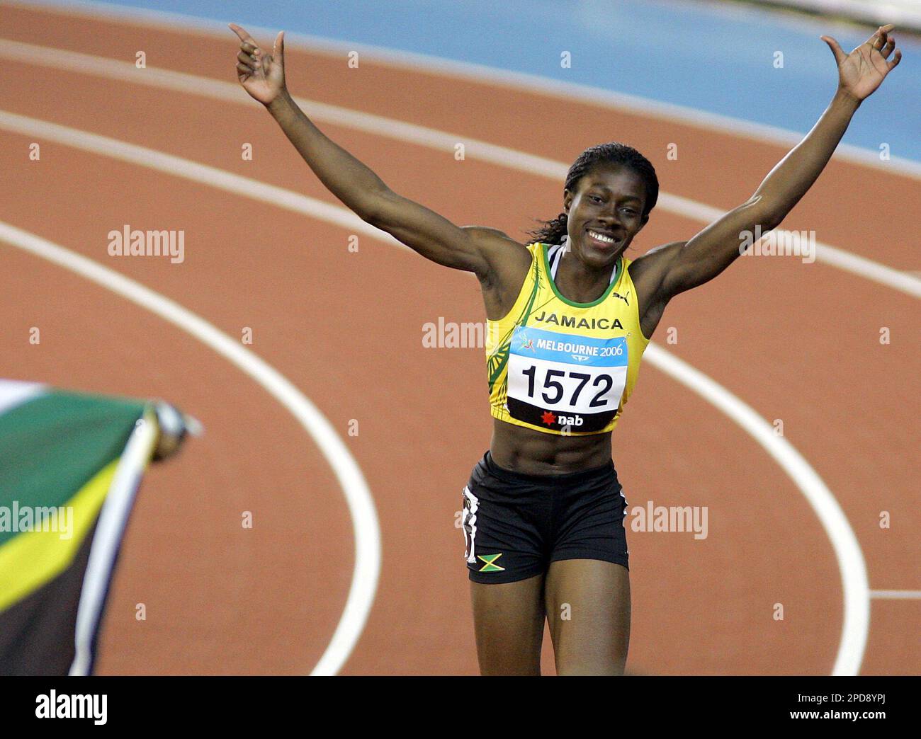 Sheri-Ann Brooks of Jamaica celebrates after winning the gold medal in ...