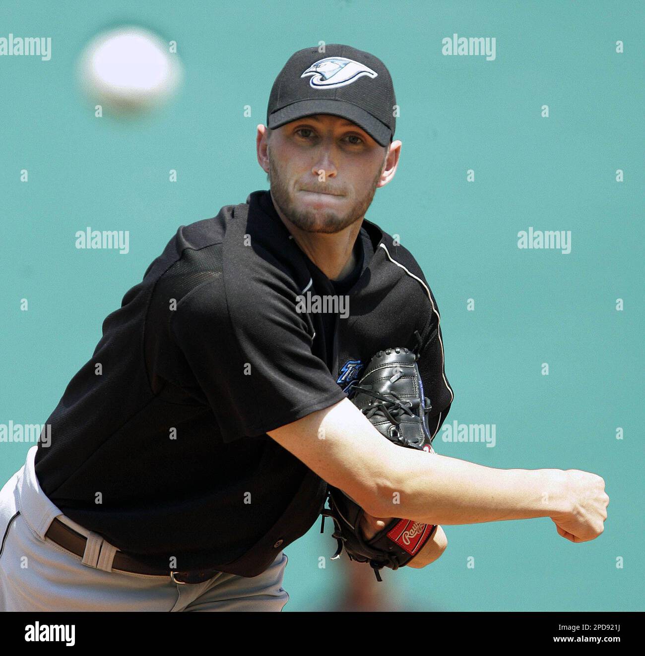 Toronto Blue Jays starting pitcher Josh Towers throws a warmup pitch ...