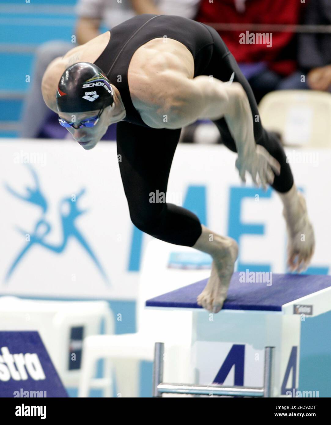 South Africa's Roland Schoeman starts the men's 50m freestyle semi ...