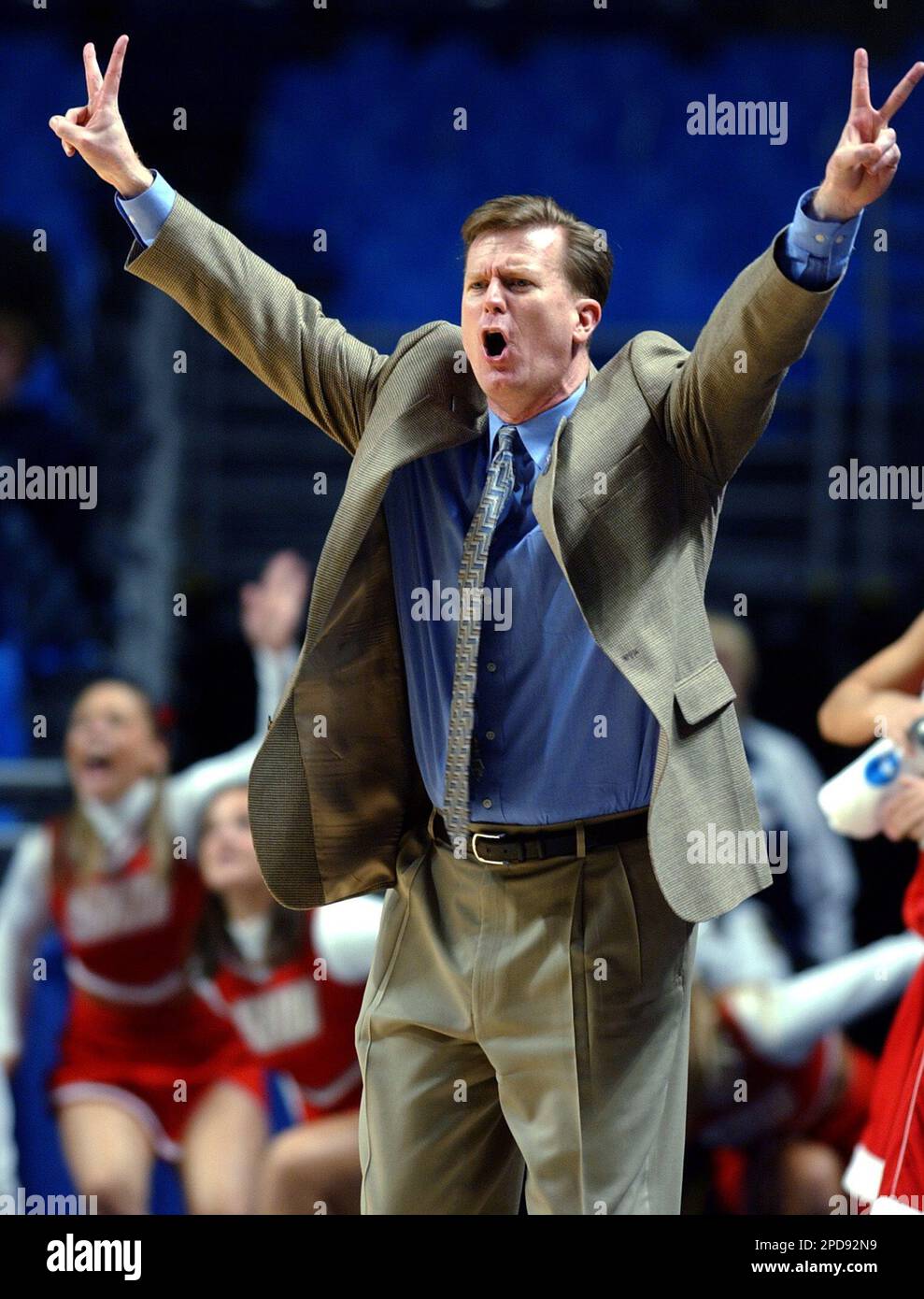 Sacred Heart head coach Ed Swanson gestures to his team in the first ...