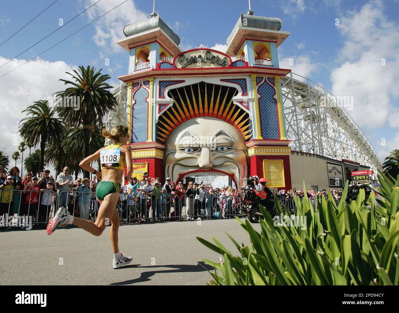 Australia's Kerryn McKann passes Luna Park during the women's marathon ...