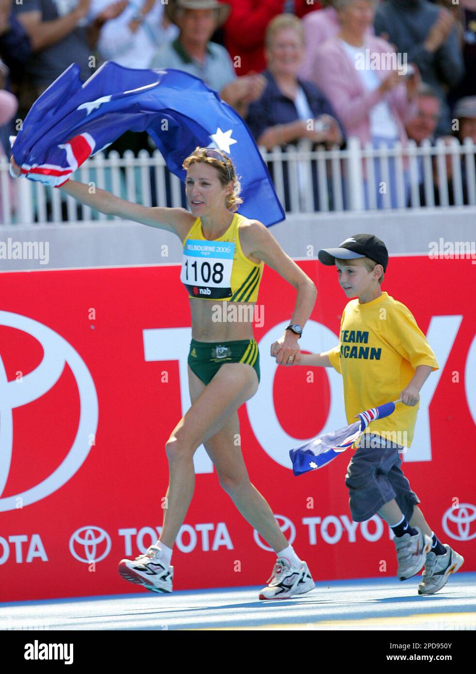 Australia's Kerryn McCann celebrates with her son Brenton after winning ...